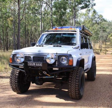 Nissan Pathfinder Overland Build on 35s with Titan Swap and 6" Lift